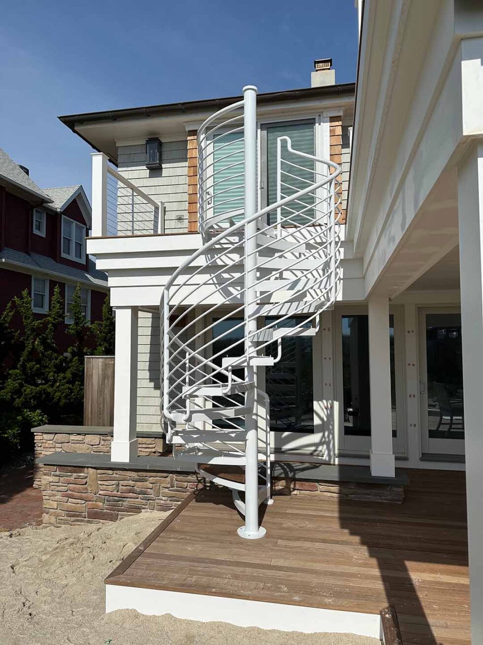 Custom Spiral Staircase with Curved Horizontal Line Railing | Newman ...