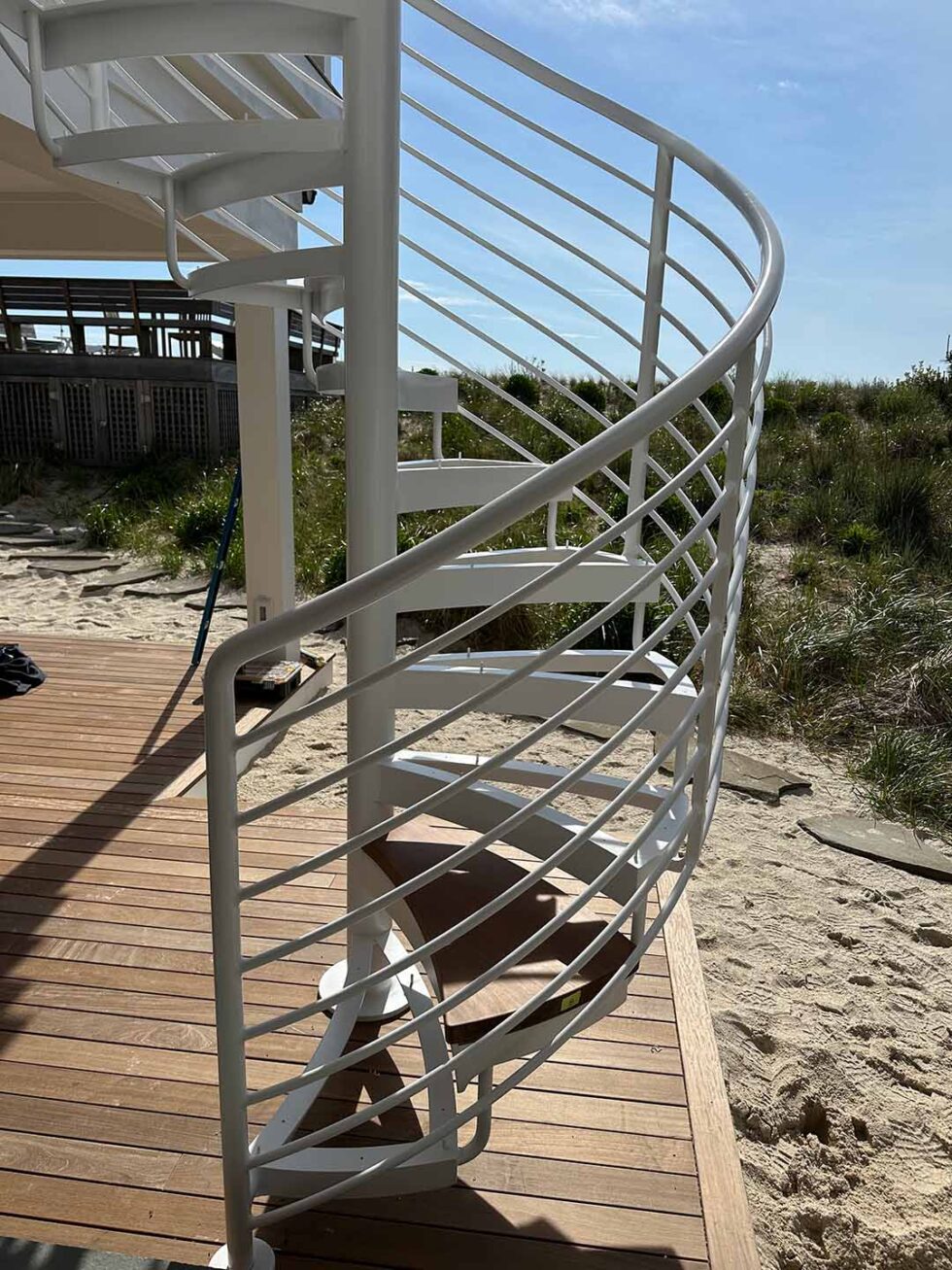 Custom Spiral Staircase with Curved Horizontal Line Railing | Newman ...