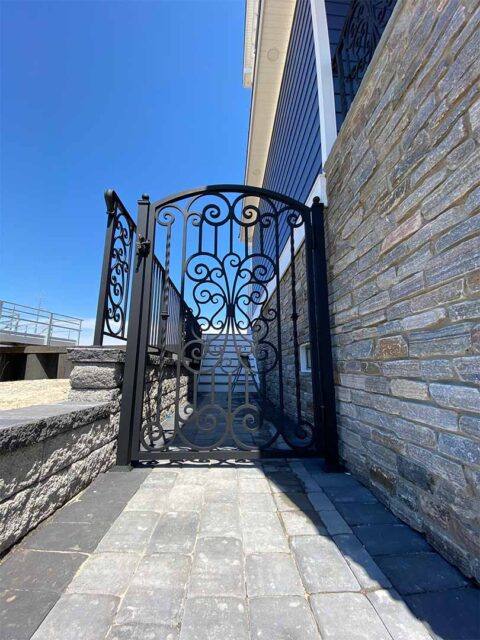 Aluminum Dock Gate featuring a classic scroll design | Newman Iron Works