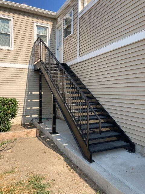 Exterior Metal Staircase featuring a robust C-channel stringer design ...